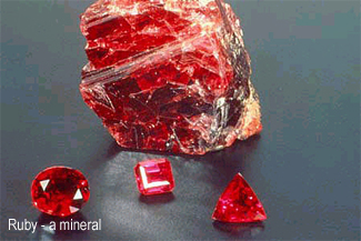 Give an example of both a mineral and a rock.